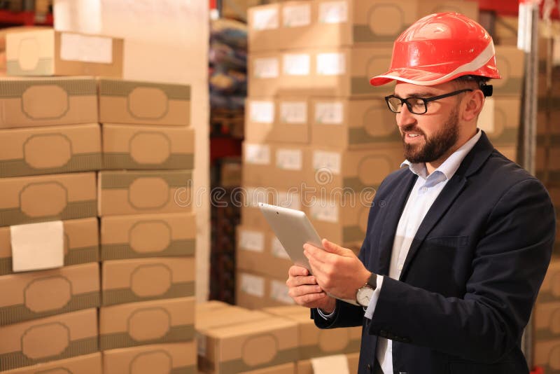 Manager with Tablet Working at Warehouse. Logistics Center Stock Image ...