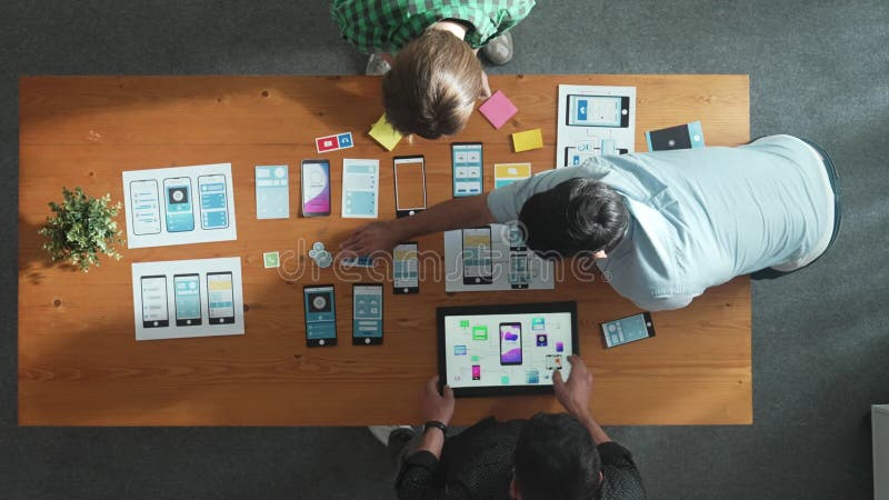 Manager Take a Note in Sticky Note while Team Working on Ui Design ...