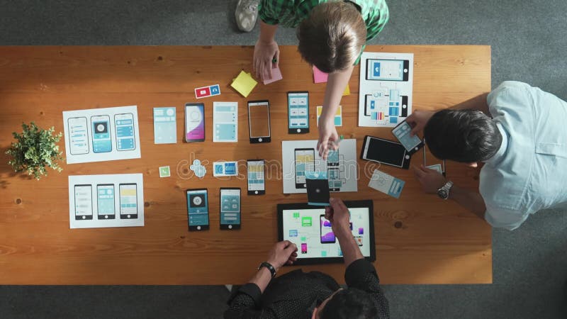 Manager Take a Note in Sticky Note while Team Working on Ui Design ...