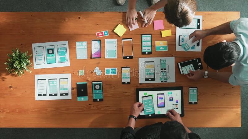 Manager Take a Note in Sticky Note while Team Working on Ui Design ...