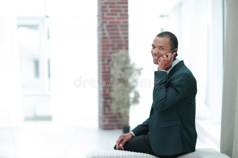 Manager Talking on Mobile Phone in Office Stock Photo - Image of ...