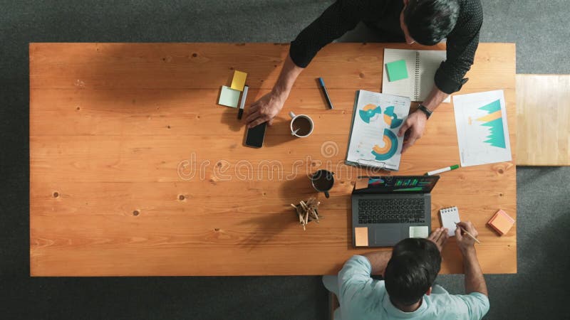 Manager Talking To Boss by Using Phone while Team Sharing Idea ...