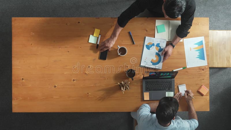 Manager Talking To Boss by Using Phone while Team Sharing Idea ...