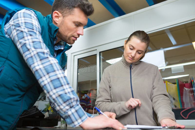 Manager Talking To Worker in Warehouse Stock Photo - Image of business ...