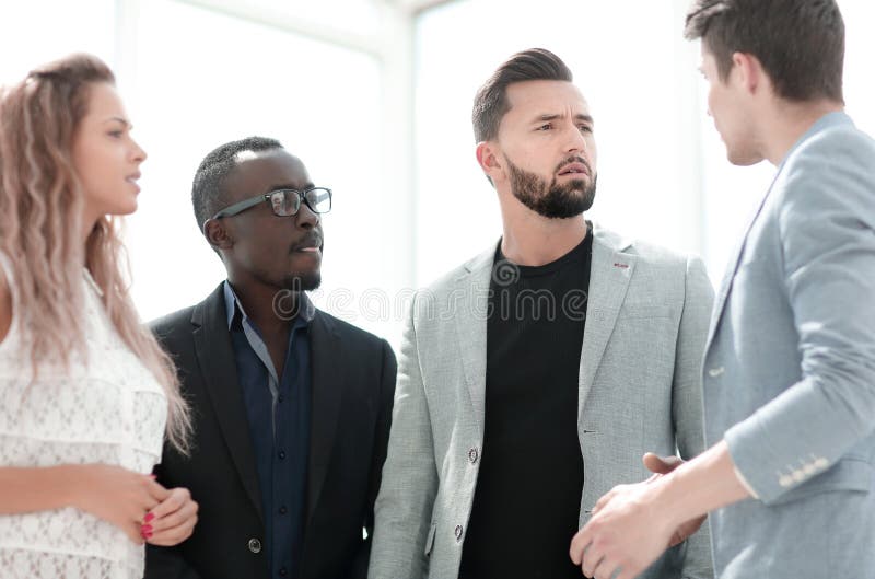 Manager Talking with Young Employees Stock Photo - Image of looking ...