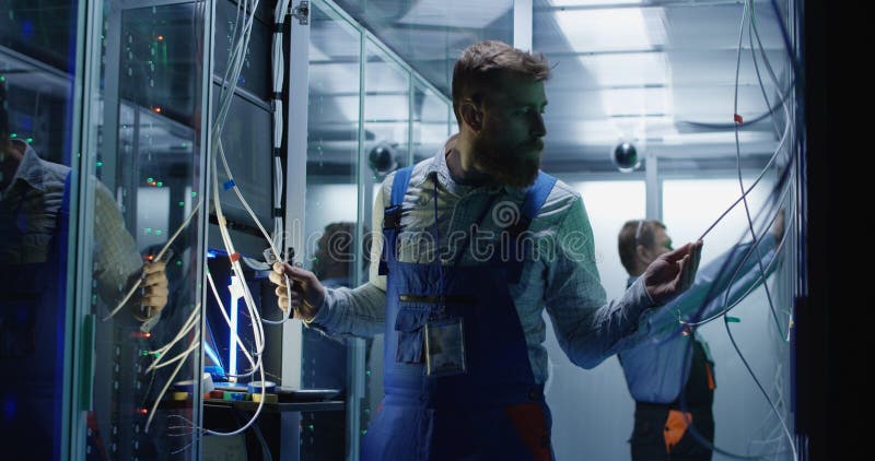 Manager and Technician Working in a Data Center Stock Image - Image of ...