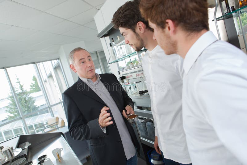 Manager Training Two New Waiting Staff Stock Photo - Image of room ...