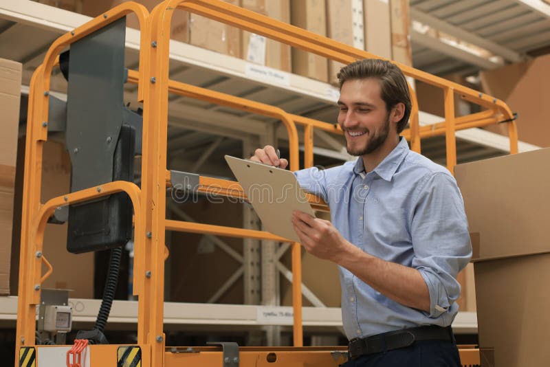 Manager Use His Tablet for Online Checking Products Available Stock ...