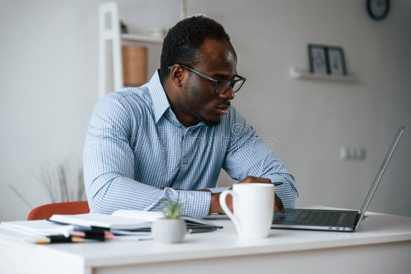 Manager is Using Laptop. Businessman is Working in the Office Stock ...