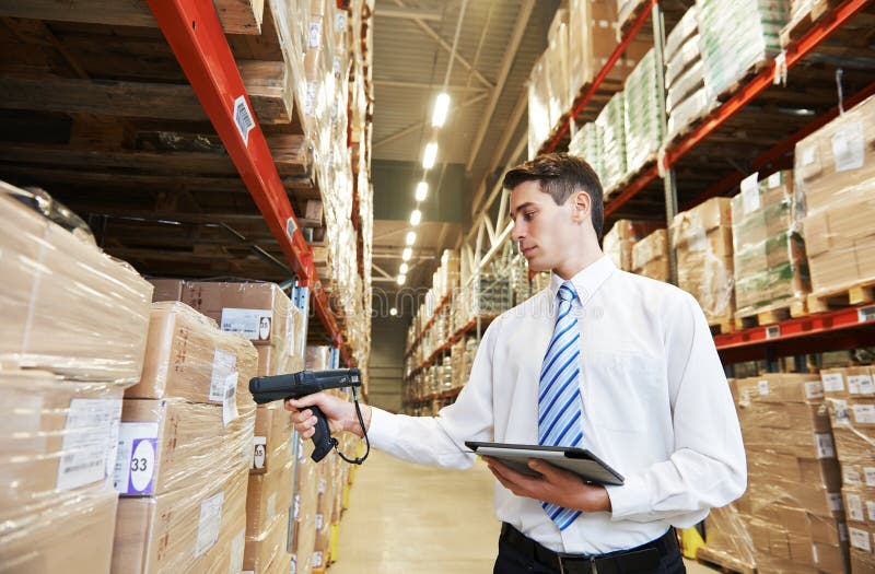 Person at Computer Terminal in Distribution Warehouse Stock Image ...