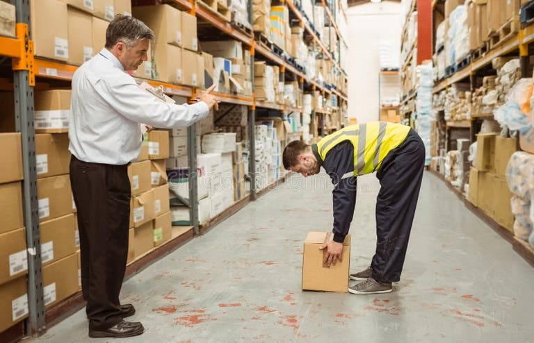 Manager Watching Worker Carrying Boxes Stock Photo - Image of warehouse ...