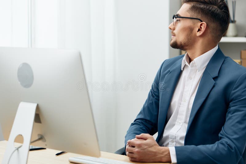 Manager Wearing Glasses Works at a Computer Office Executive Stock ...