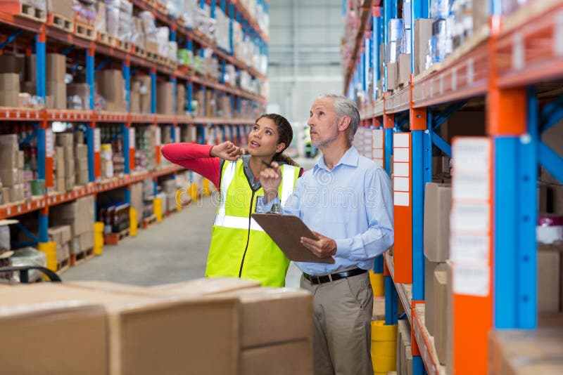 Manager and Worker are Looking Shelves Stock Image - Image of ...