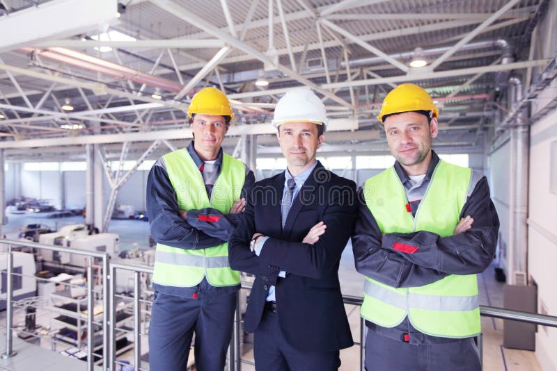 Manager and Workers in Factory Stock Photo - Image of lathe, mechanic ...