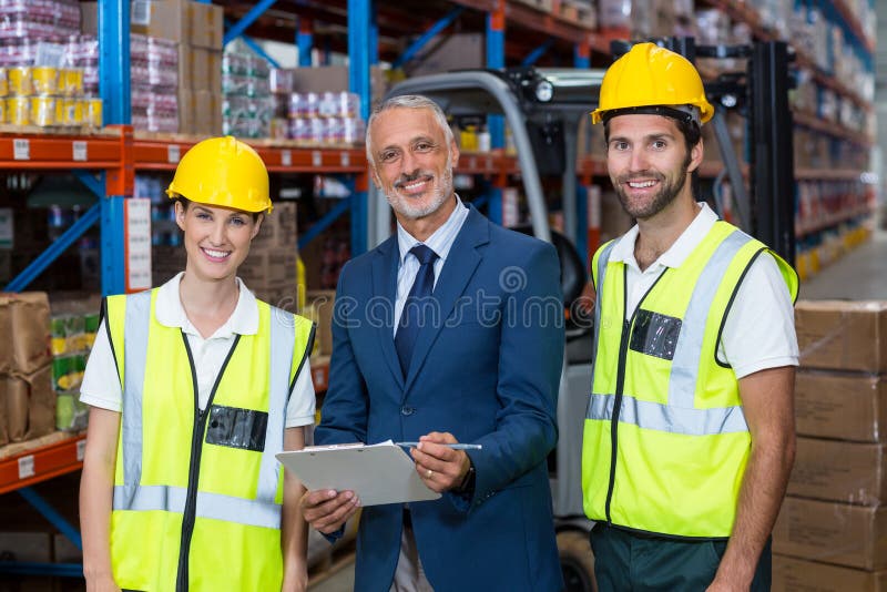 Manager and Workers are Posing and Looking the Camera Stock Image ...