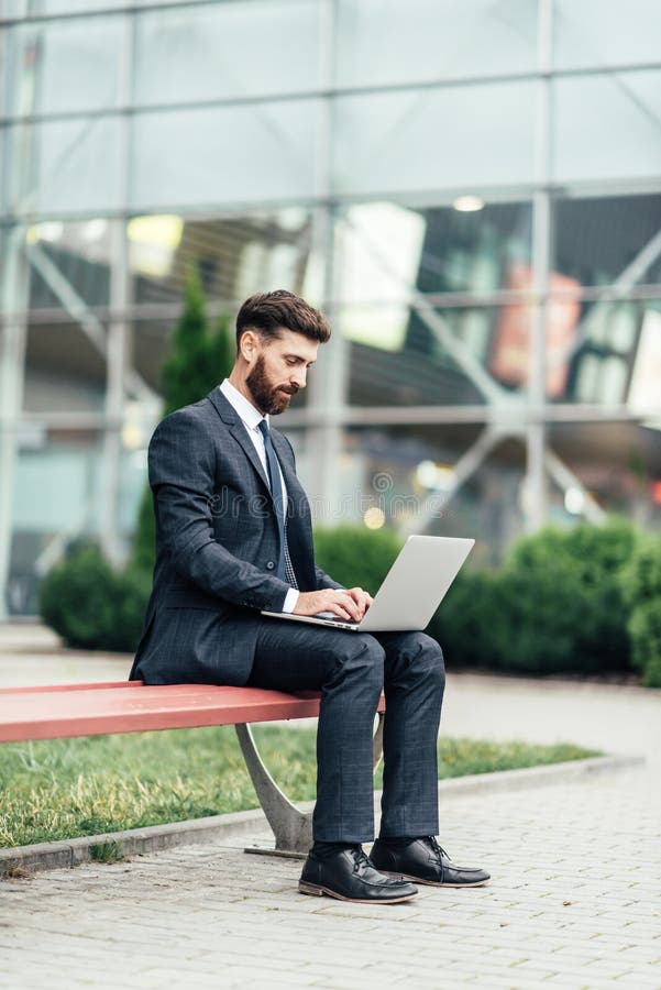 Manager Working on the Laptop in the Airport Terminal Stock Photo ...