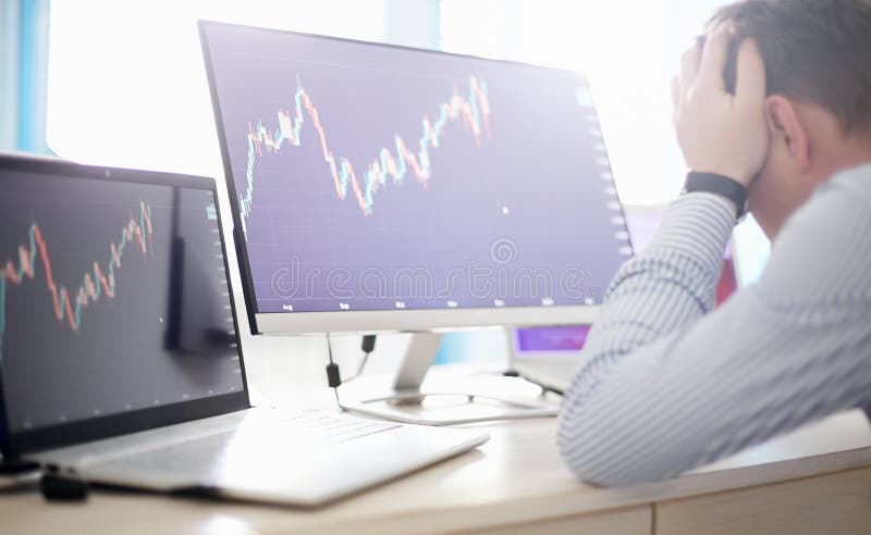 Manager Working in Office, Computer Monitors with Graphs Stock Photo ...