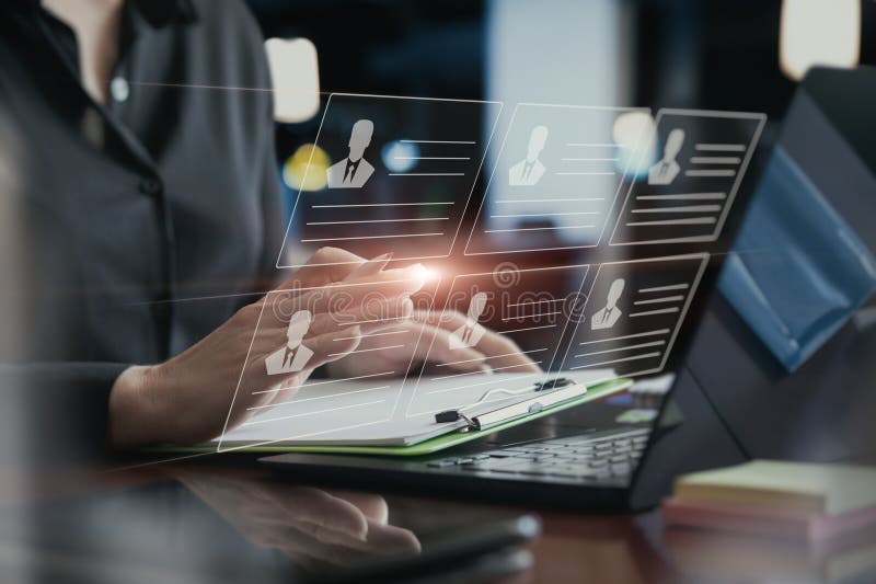 Manager Working in the Office with the Resumes of the Employees Stock ...