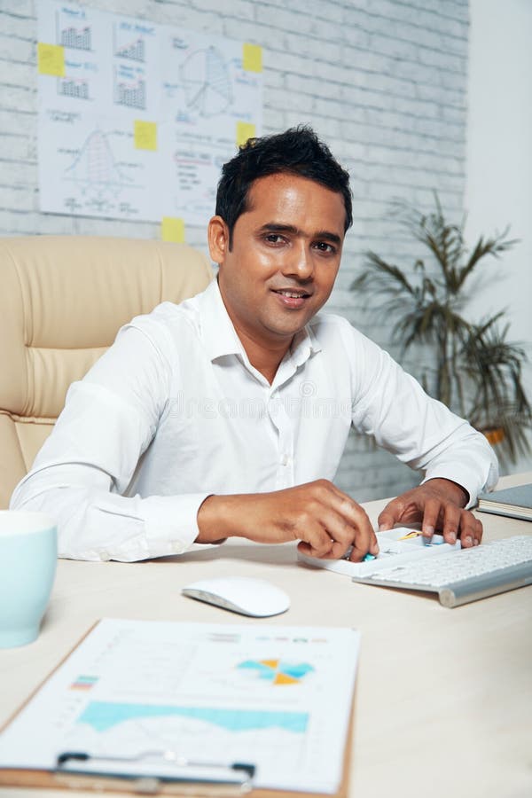 Manager Working at the Table at Office Stock Image - Image of indian ...