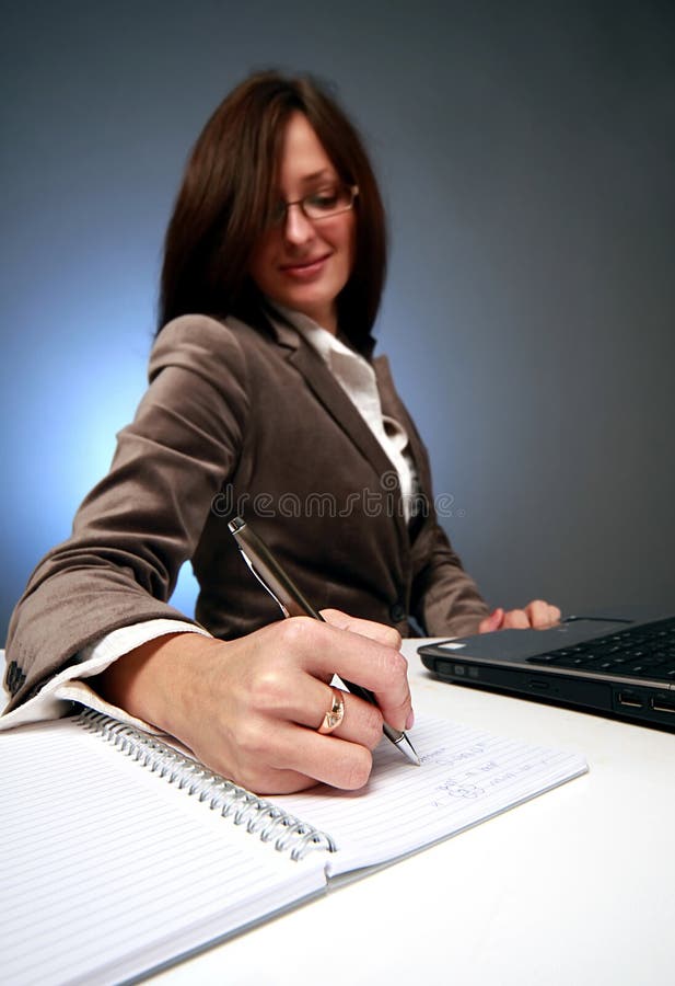 Secretary Writing Notes at Desk Stock Image - Image of alone, european ...