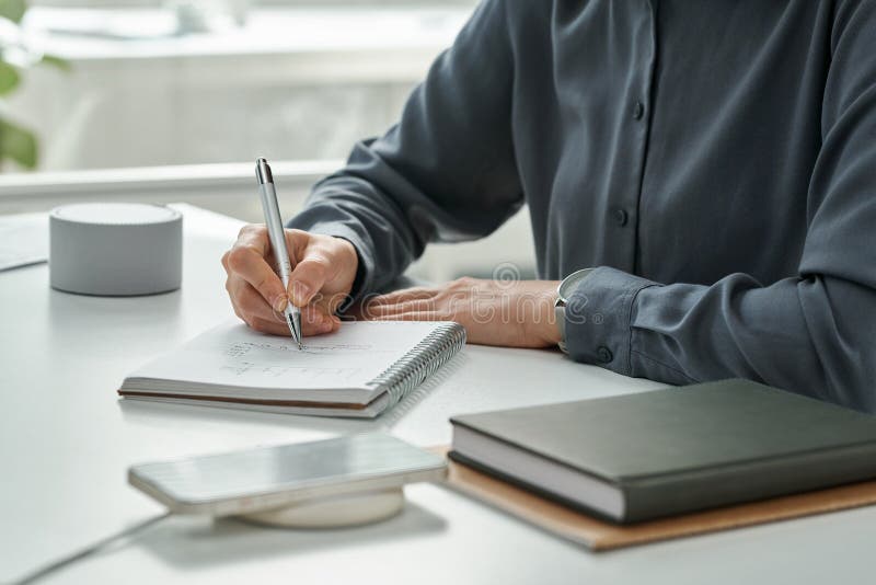 Manager Writing Plans in Notepad Stock Photo - Image of charge, notepad ...