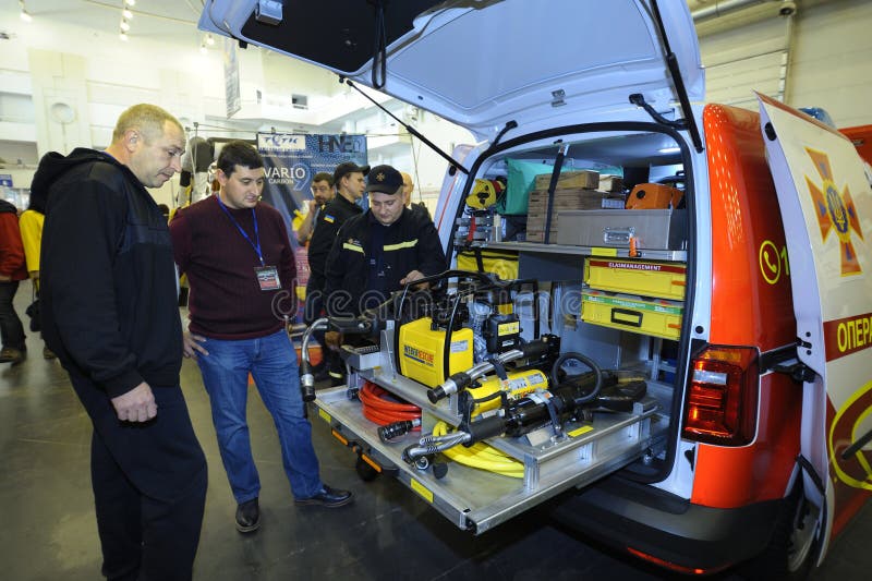 Managers Discussing Equipment for Technical Rescue and Support, Compact ...