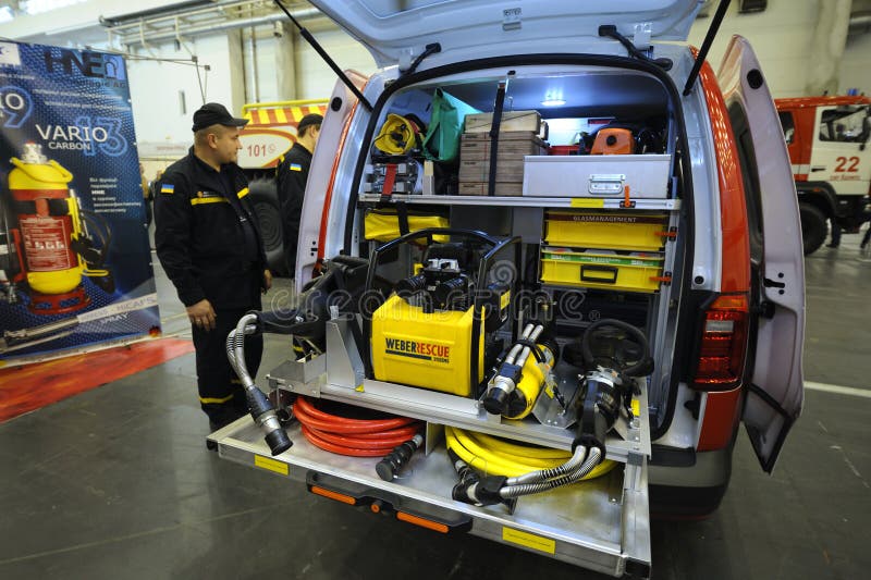 Managers Discussing Equipment for Technical Rescue and Support, Compact ...