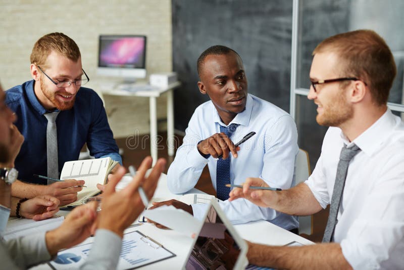 Managers discussing ideas stock image. Image of explaining - 74240493