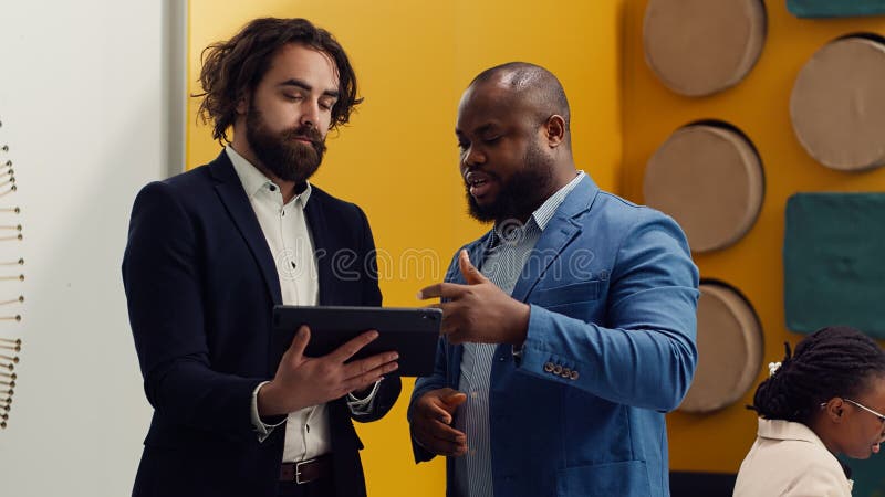 Managers Examining Infographics To Provide Input on an Issue Affecting ...