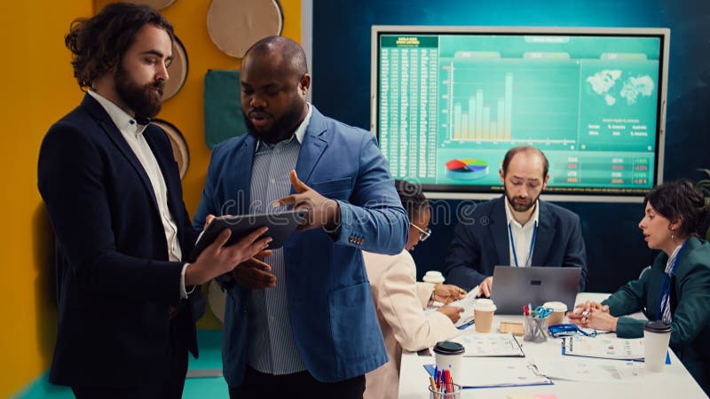 Managers Examining Infographics To Provide Input on an Issue Affecting ...