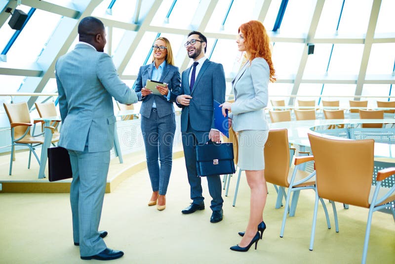 Managers talking stock photo. Image of teamwork, intercultural - 60415928