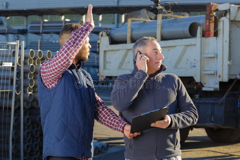 Managers Working Together in Industrial Situation Stock Image - Image ...