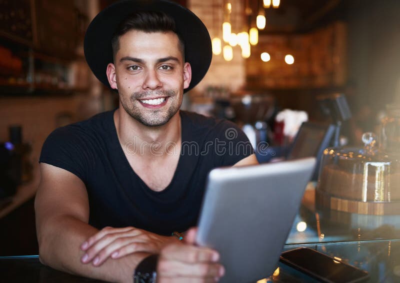 Managing a Cafe is so Much Simpler with Smart Technology. a Young Man ...