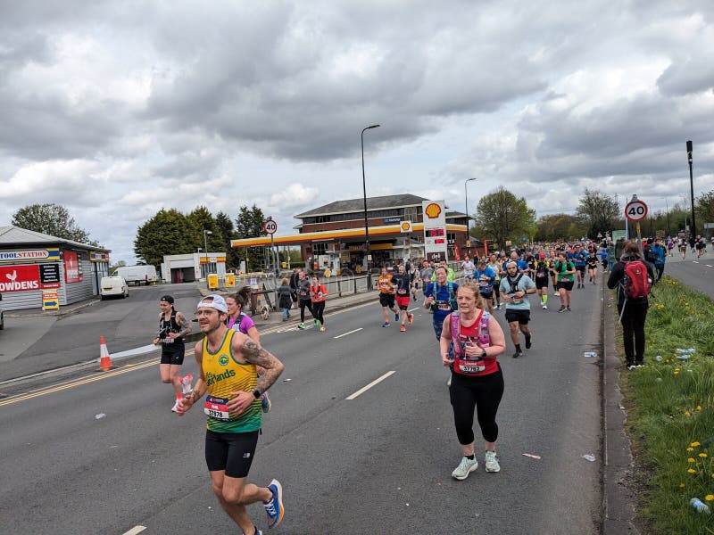 Manchester Marathon 2024 Runners Go Down the A56 Editorial Stock Image ...