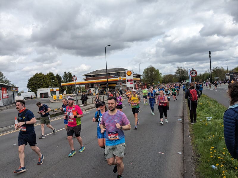 Manchester Marathon 2024 Runners Go Down the A56 Editorial Image ...
