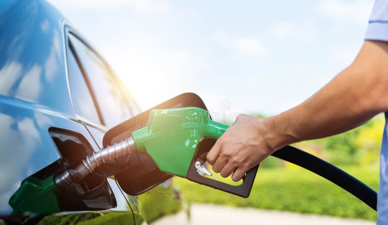 Hand Refilling the Car with Fuel Stock Image - Image of handle ...