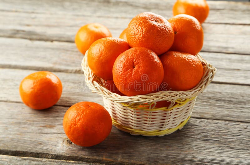 Mandarin in Basket on Grey Wooden Background. Stock Photo - Image of ...