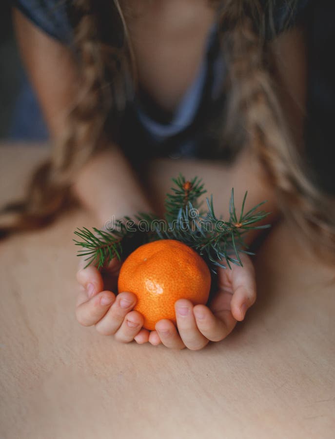Mandarin in Children`s Hands Stock Image - Image of fresh, person ...