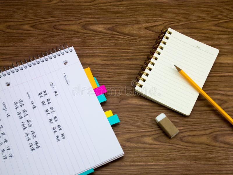 Mandarin; Learning New Language Writing Words on the Notebook Stock ...