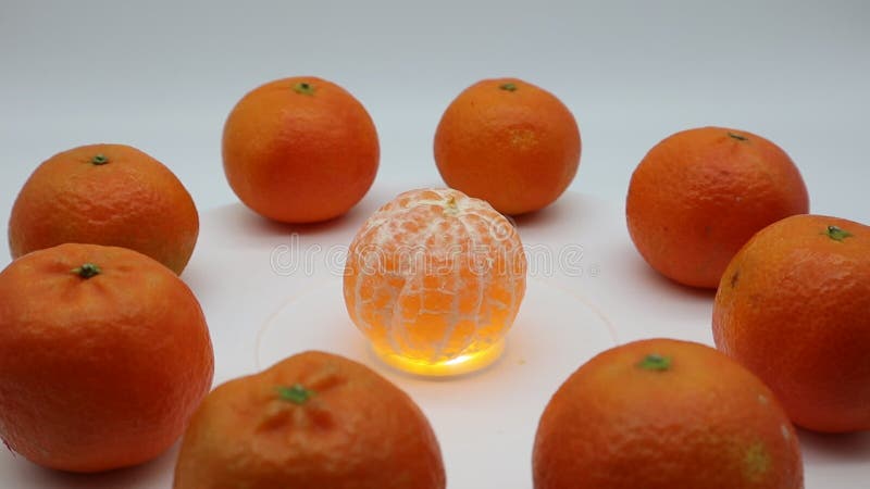 Mandarin Oranges Fruit on Rotating Display Isolated on White Background ...