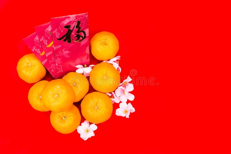 Mandarin Oranges and Red Packets with Chinese Good Luck Character Stock ...