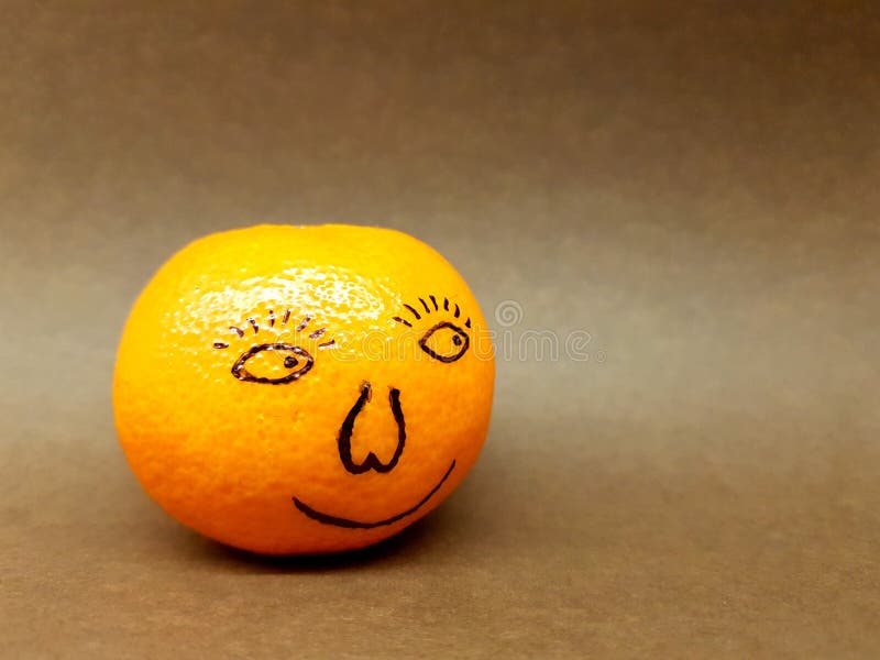 Mandarin smiley stock photo. Image of food, background - 136504412