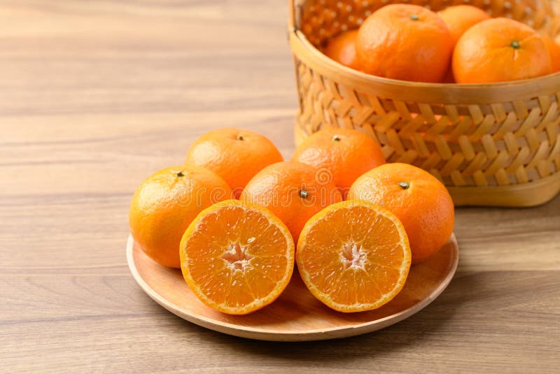 Mandarin Tangerine Orange Fruit on Wooden Plate Stock Image - Image of ...