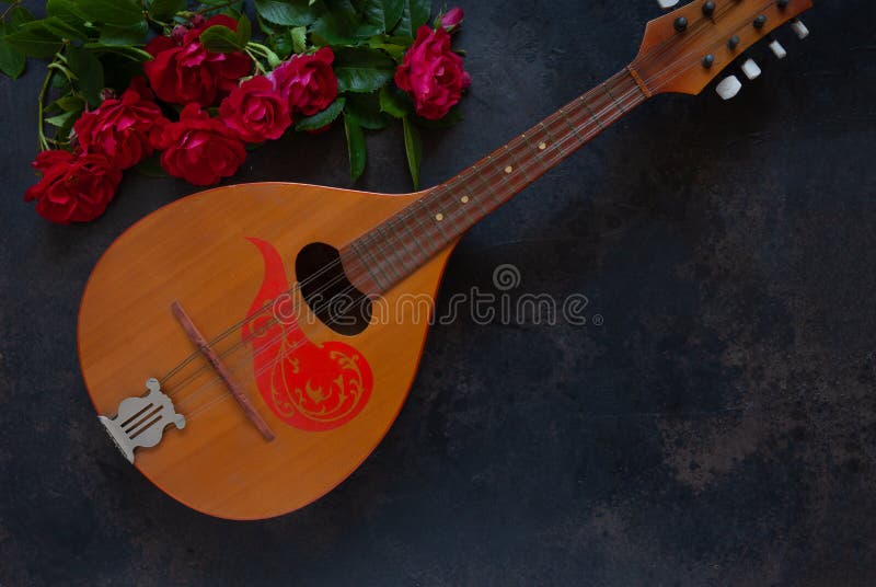 Mandolin - a Stringed Plucked Musical Instrument and a Beautiful Red ...
