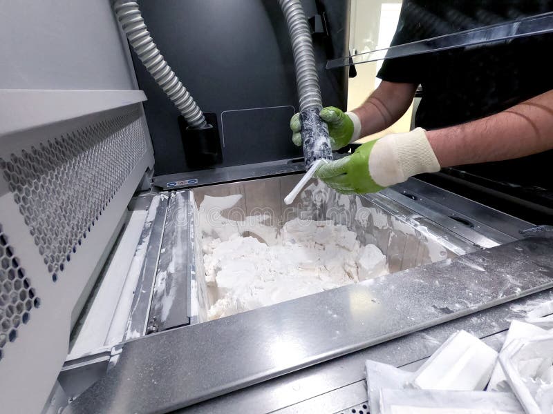 Worker Taking Out Models of White Polyamide Powder and Cleaning Them ...