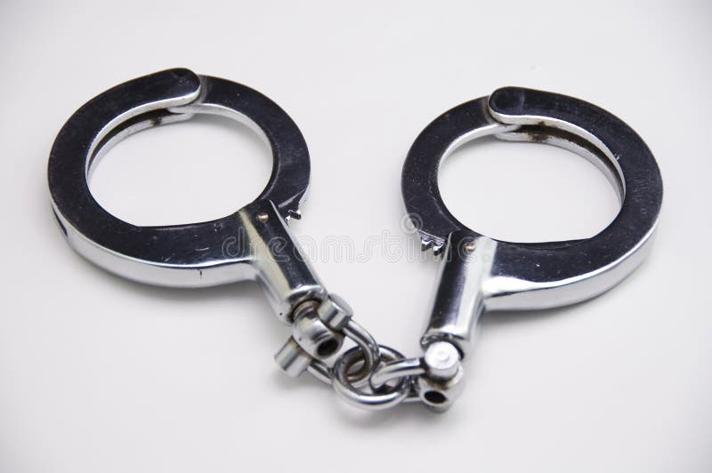Manette immagine stock. Immagine di concatenato, prigione - 1053951