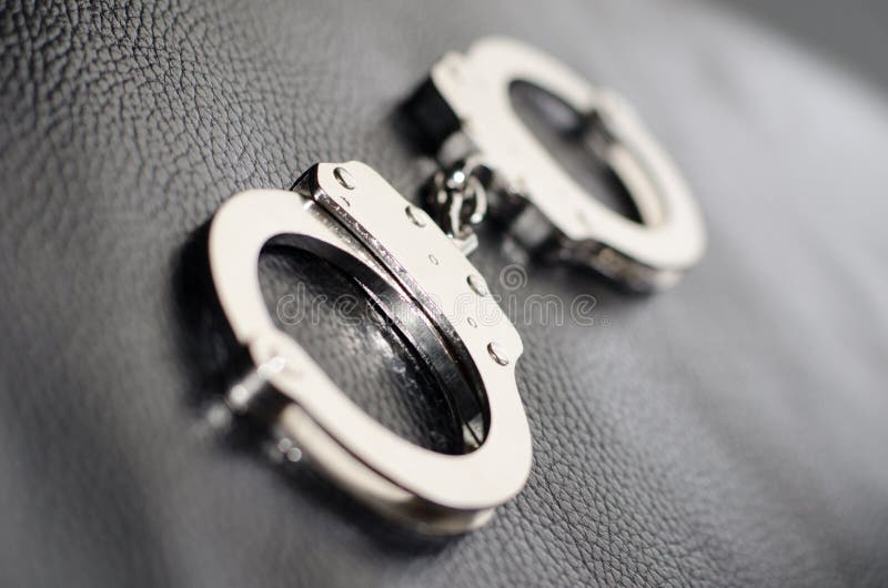 Manette fotografia stock. Immagine di arrestato, manette - 27213412