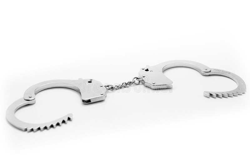 Paia Delle Manette Del Metallo Sopra Fondo Bianco Fotografia Stock ...