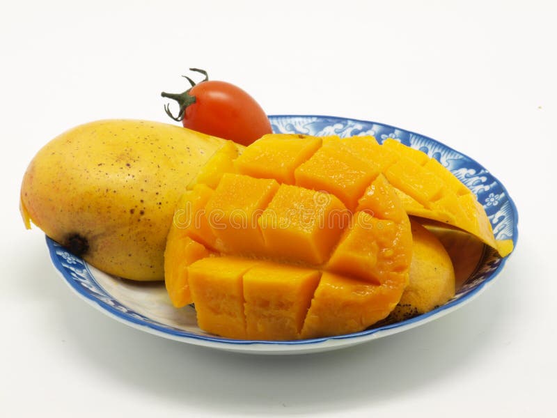 Mangoes on a Plate stock image. Image of plate, indica - 224913