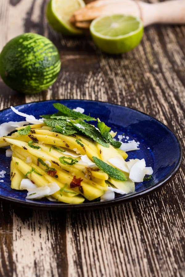 Mango Appetizer with Coconut and Chilli Stock Photo - Image of close ...